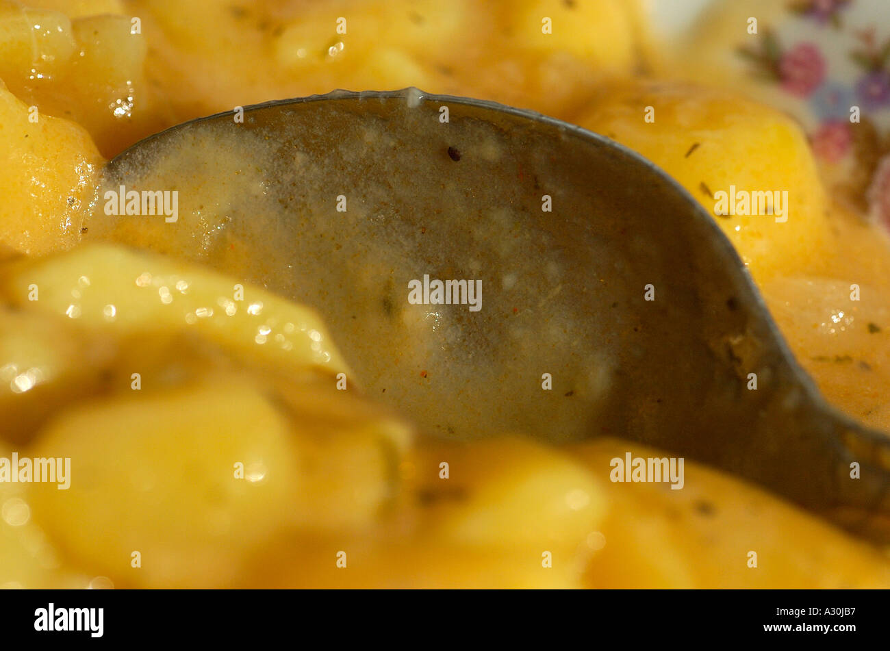 spoon in food Stock Photo - Alamy