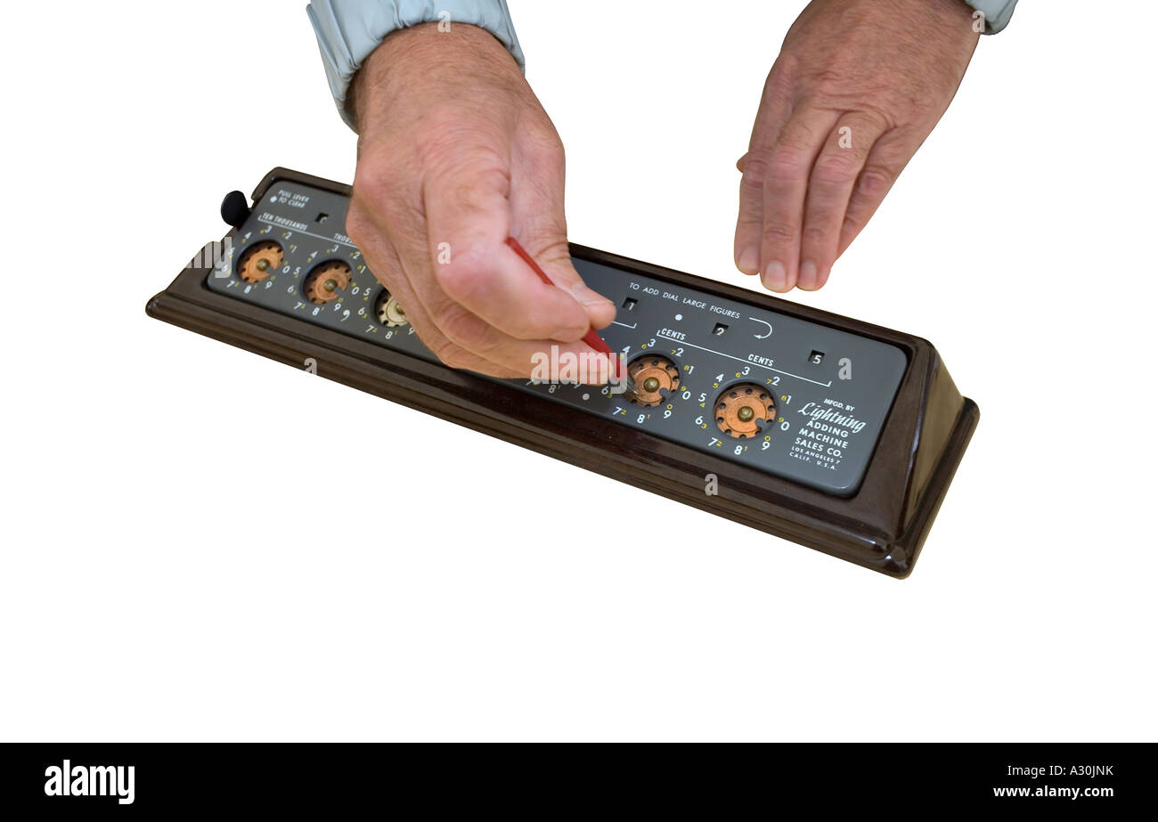 Man demonstrating the use of 1908 Lightning adding machine, antiques ...