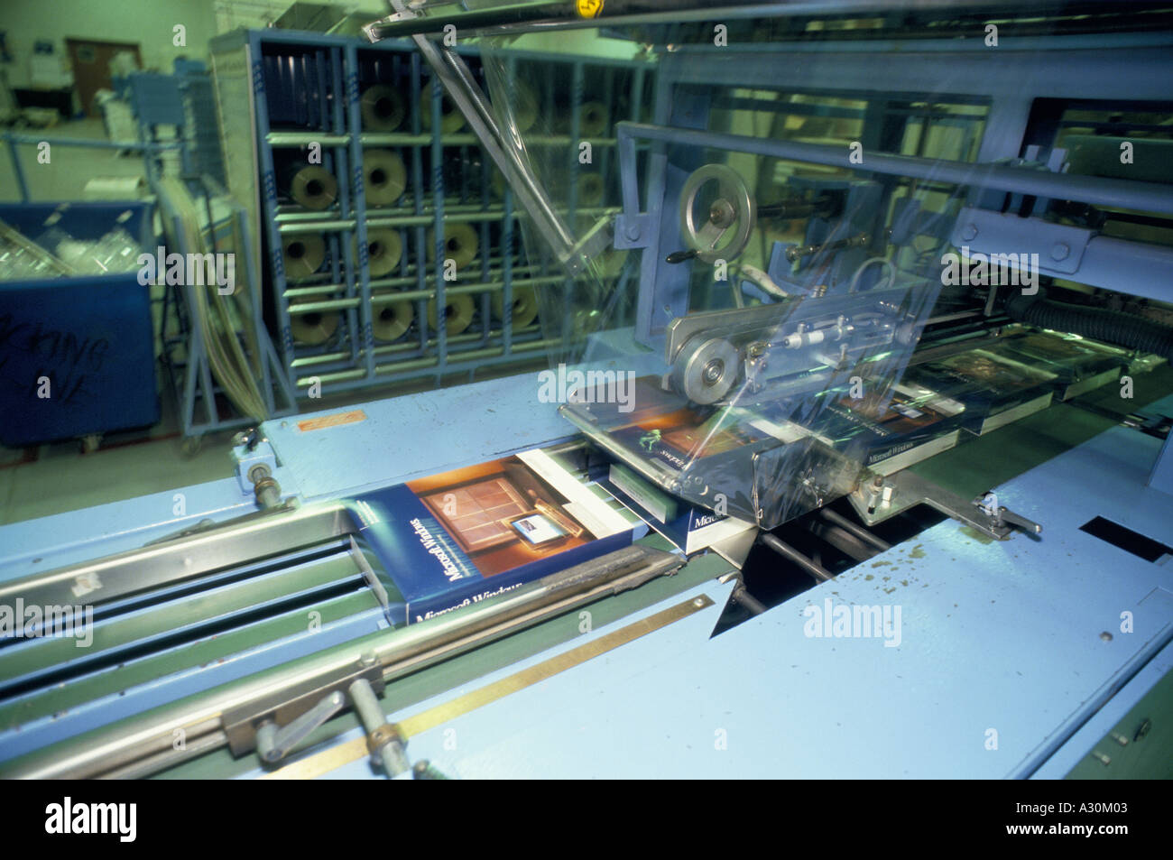 a factory machine producing microsoft software Stock Photo - Alamy