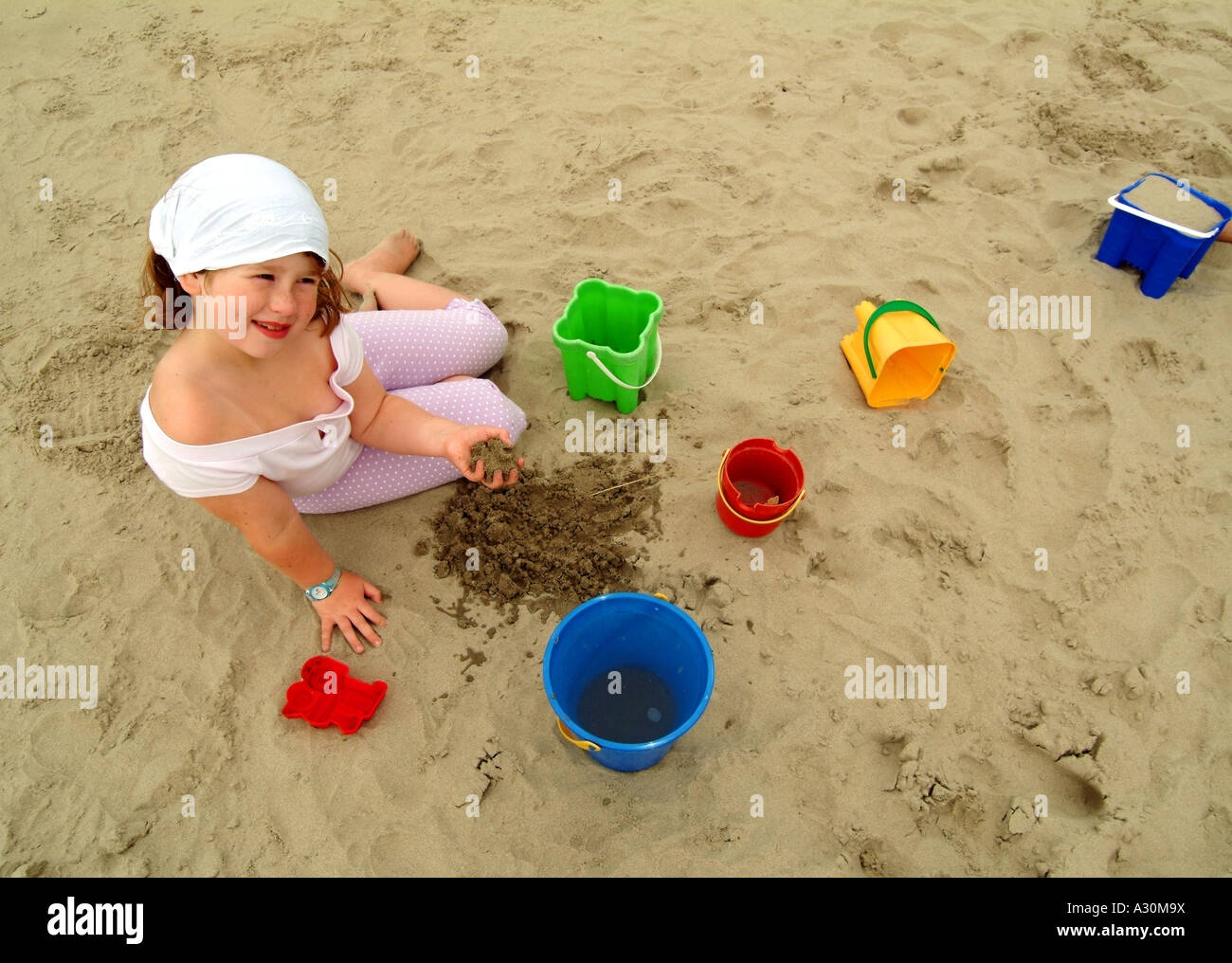 Messy sand bucket hi-res stock photography and images - Alamy
