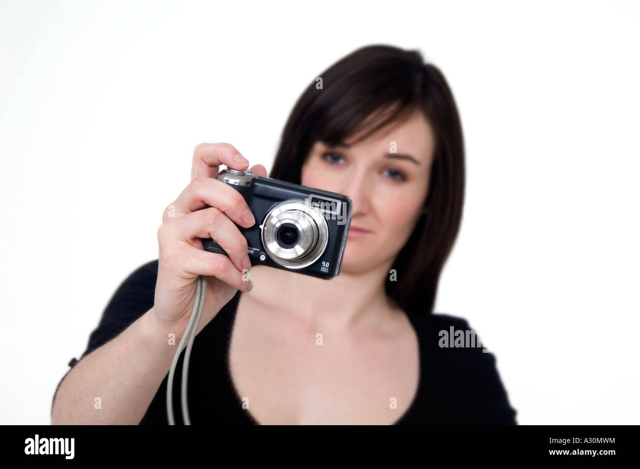 young woman holding a digital compact camera Stock Photo - Alamy