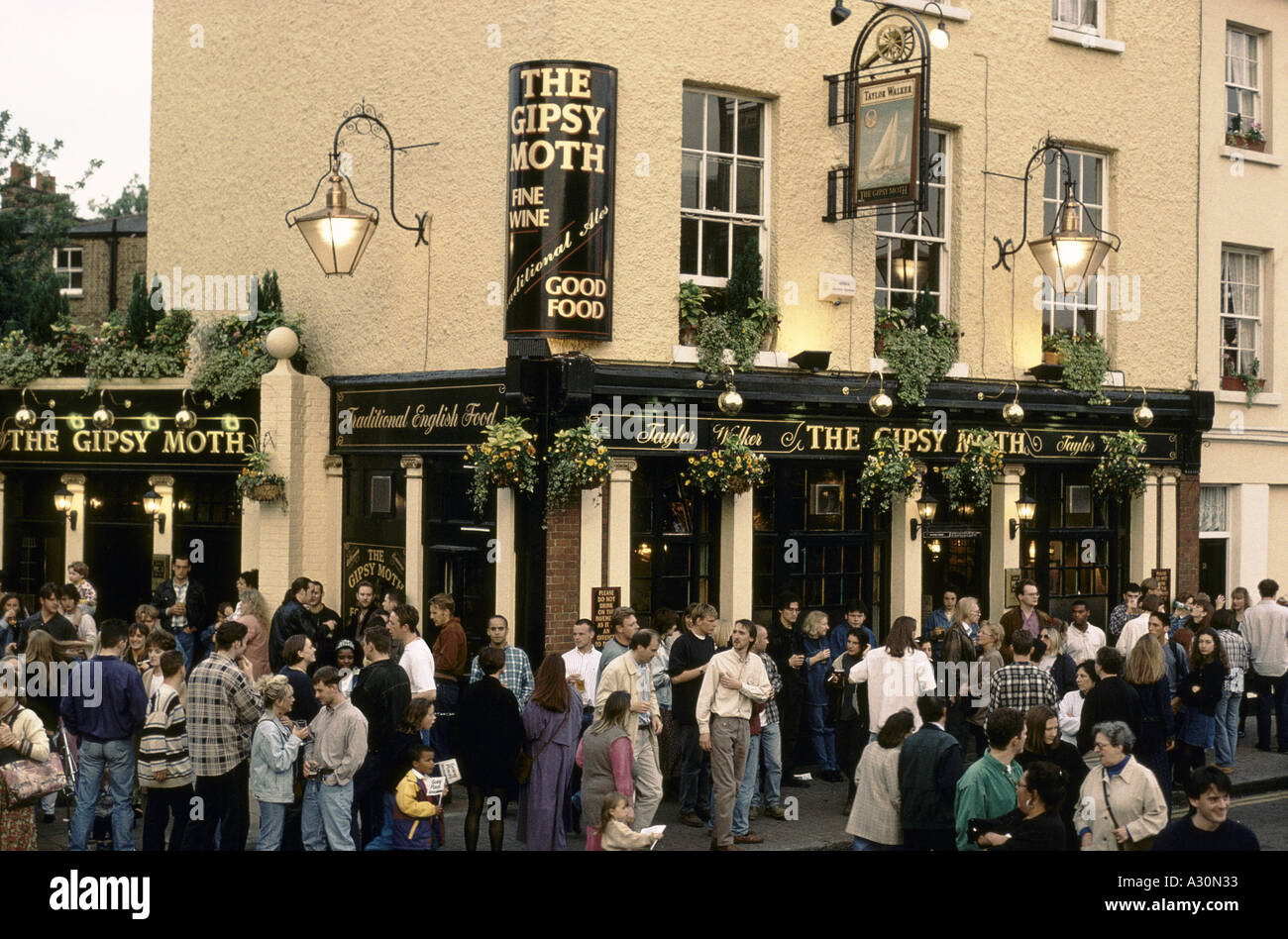a drinking crowd outside a greenwich pub in london Stock Photo - Alamy