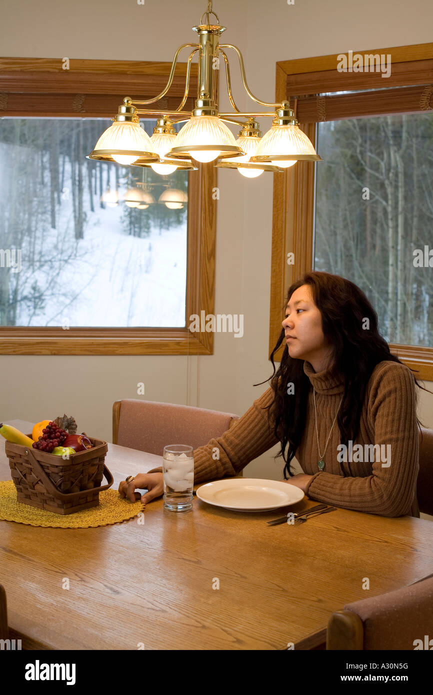 asian woman at table Stock Photo - Alamy