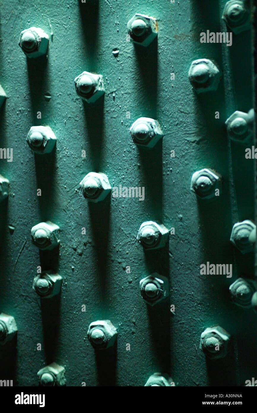 Blue Metal bolts and Shadows Stock Photo - Alamy