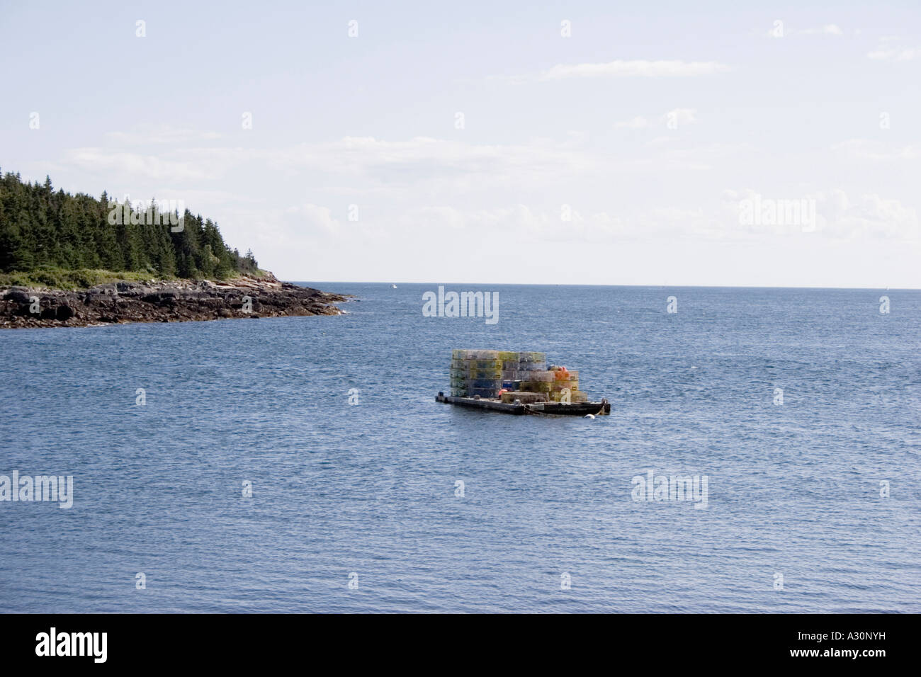 lobster traps on a float at Burnt Island in Muscongus Bay, Maine Stock ...