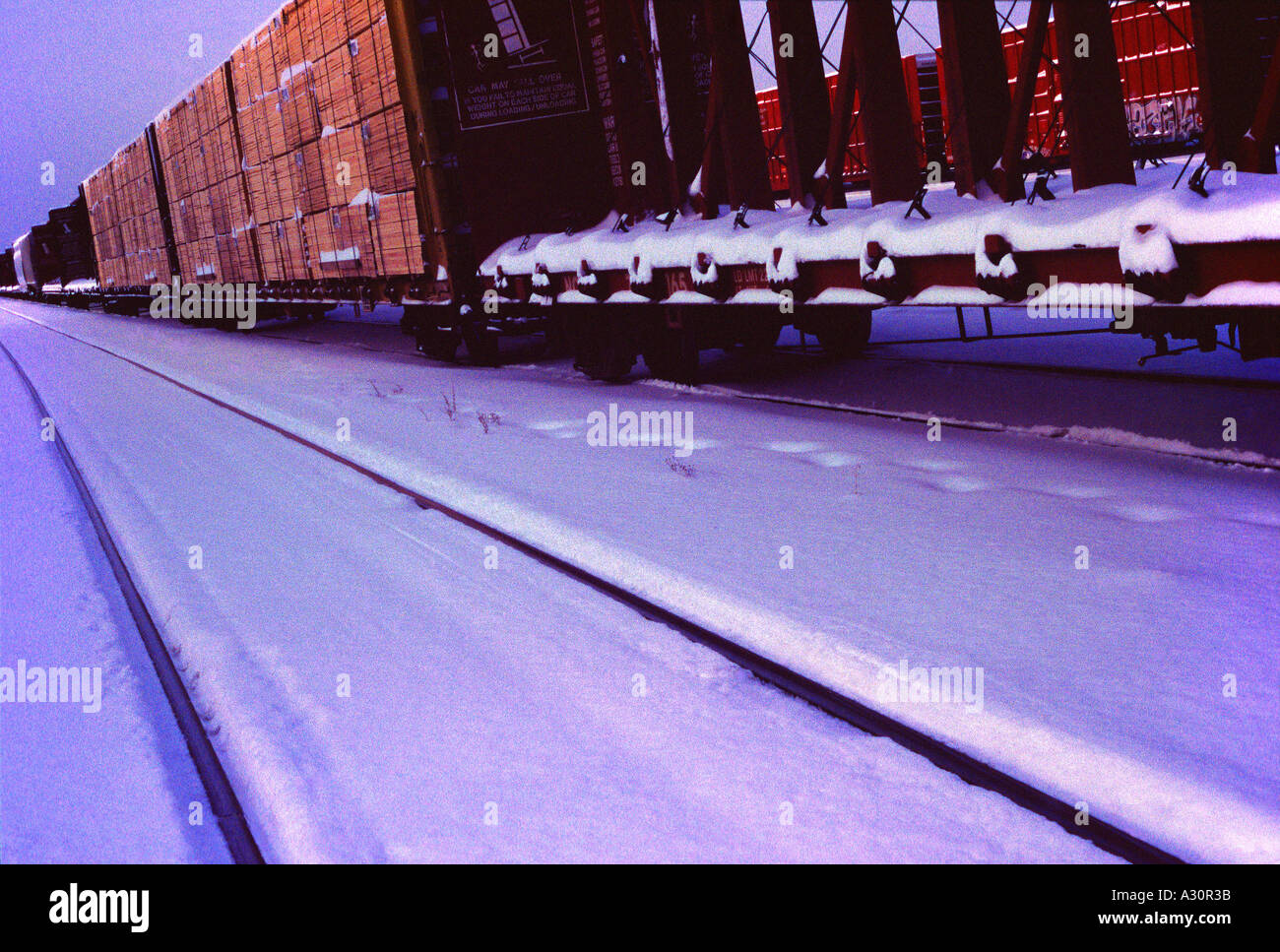 Freight train on the move Stock Photo - Alamy