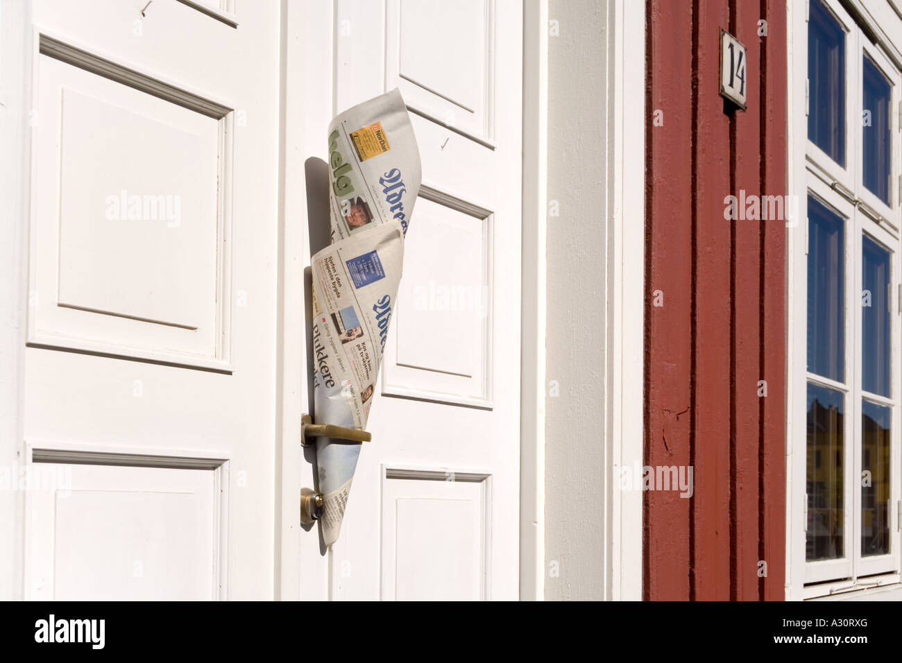 Norwegian newspaper delivery in Nedre Bakklandet Trondheim, Norway ...