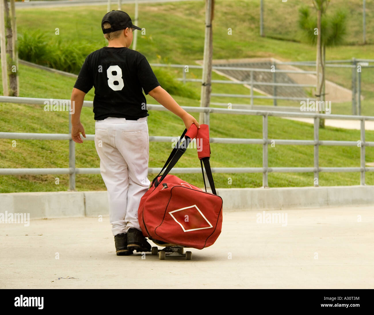 Going to baseball practice Stock Photo - Alamy