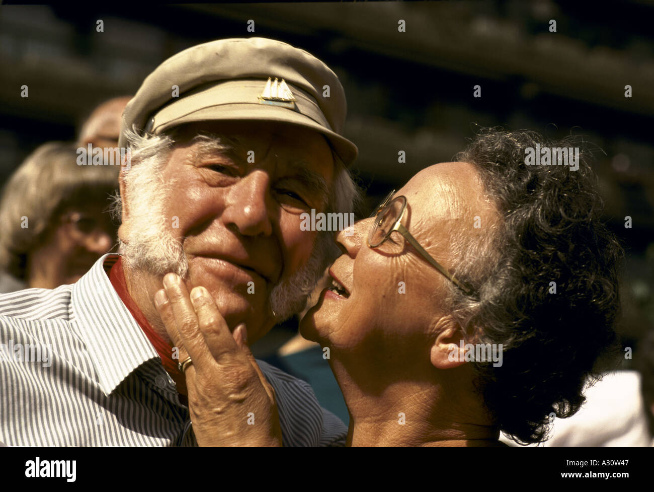 old couple embracing Stock Photo - Alamy