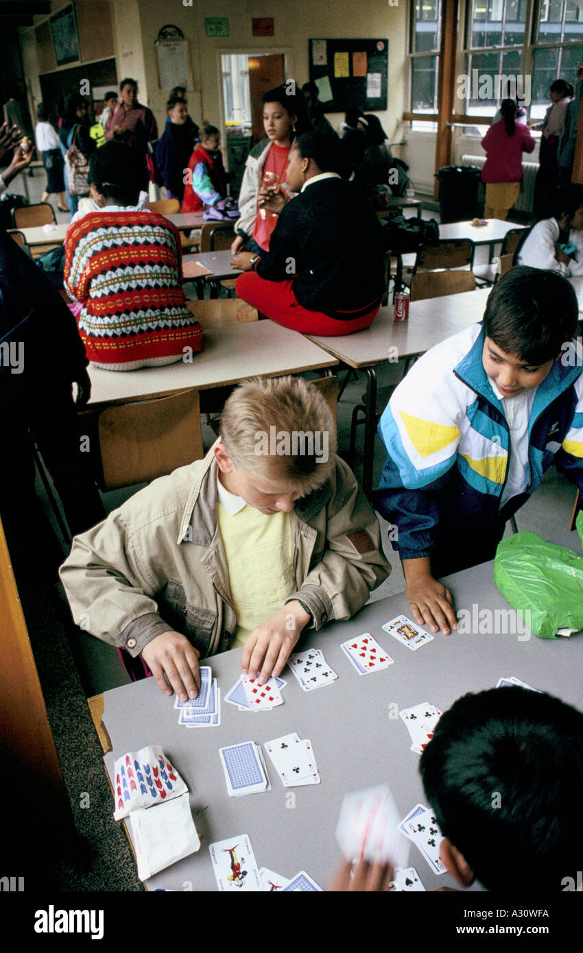 children playing card games at break time Stock Photo - Alamy