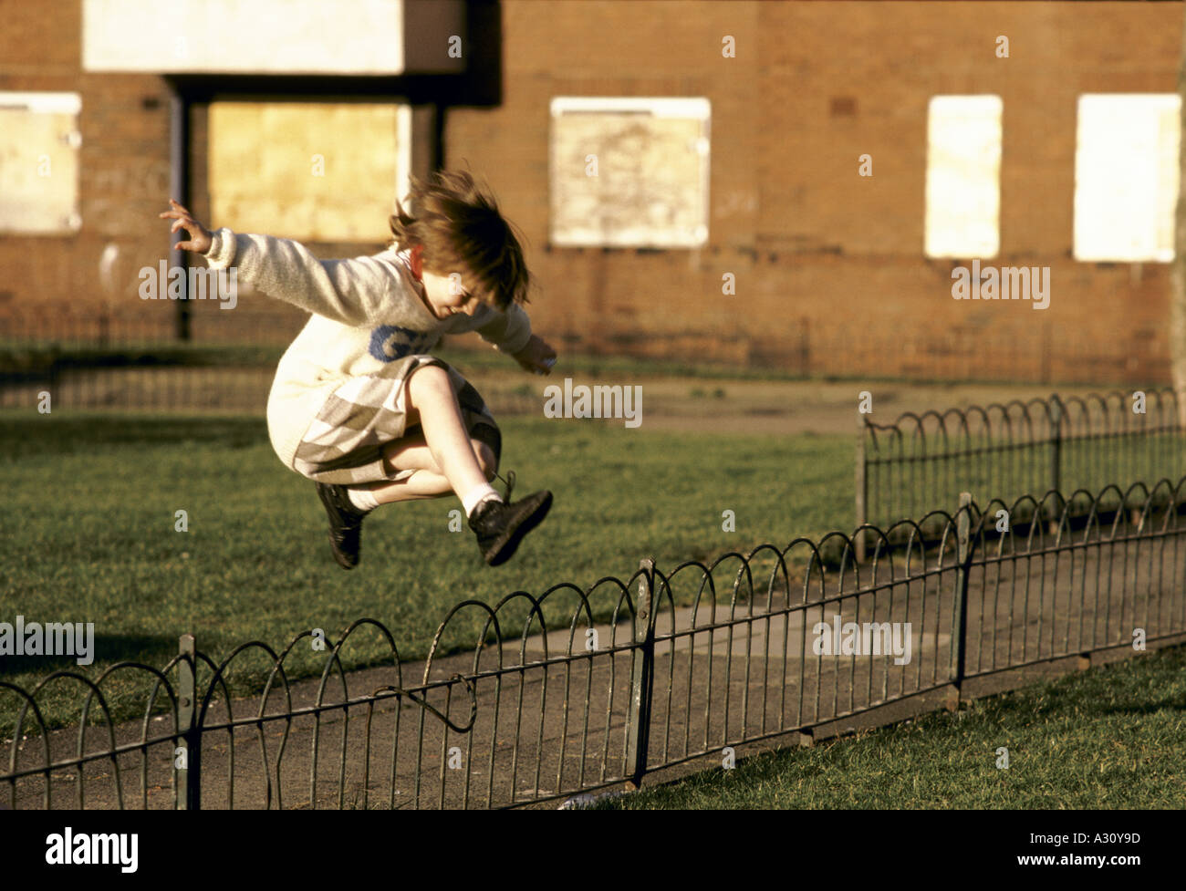 Jumping over fence hi-res stock photography and images - Alamy