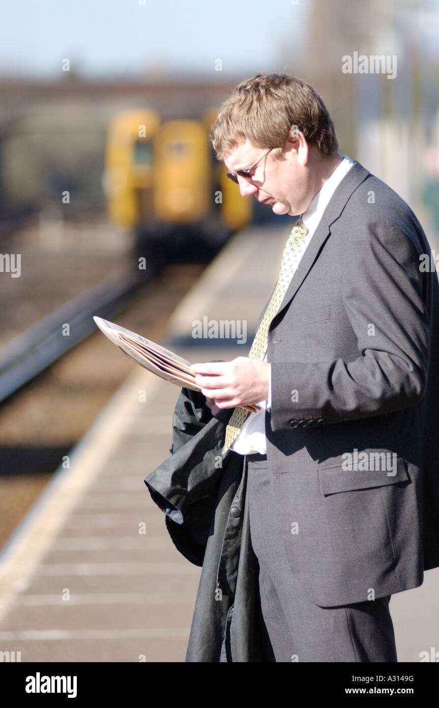 Royalty free photograph of British business man with FT commuting on ...