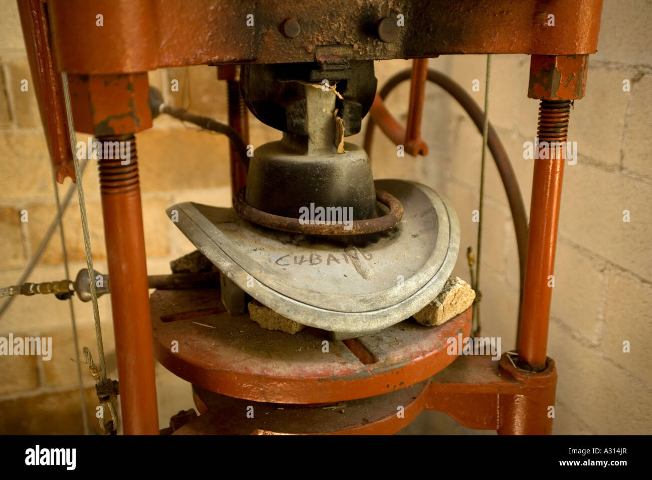 Machine that steam shapes the famous Becal panama straw hats in Mexico ...