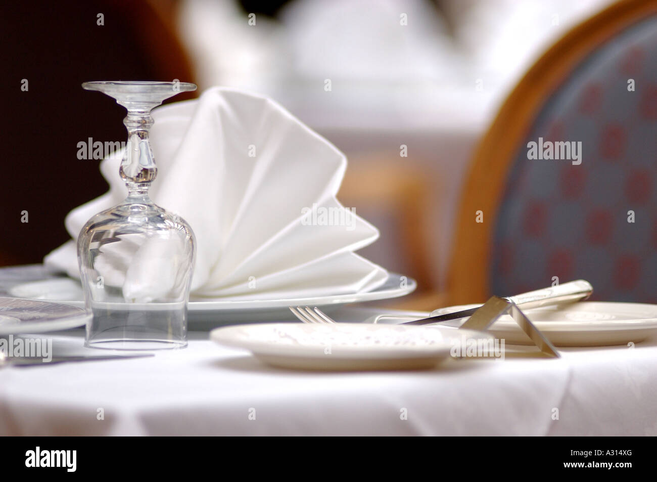 Royalty free photograph of British restaurant place setting with napkin ...