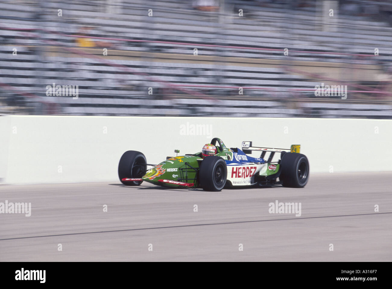 Mario Dominguez on the front straight at the Milwaukee Mile 2002 Stock ...