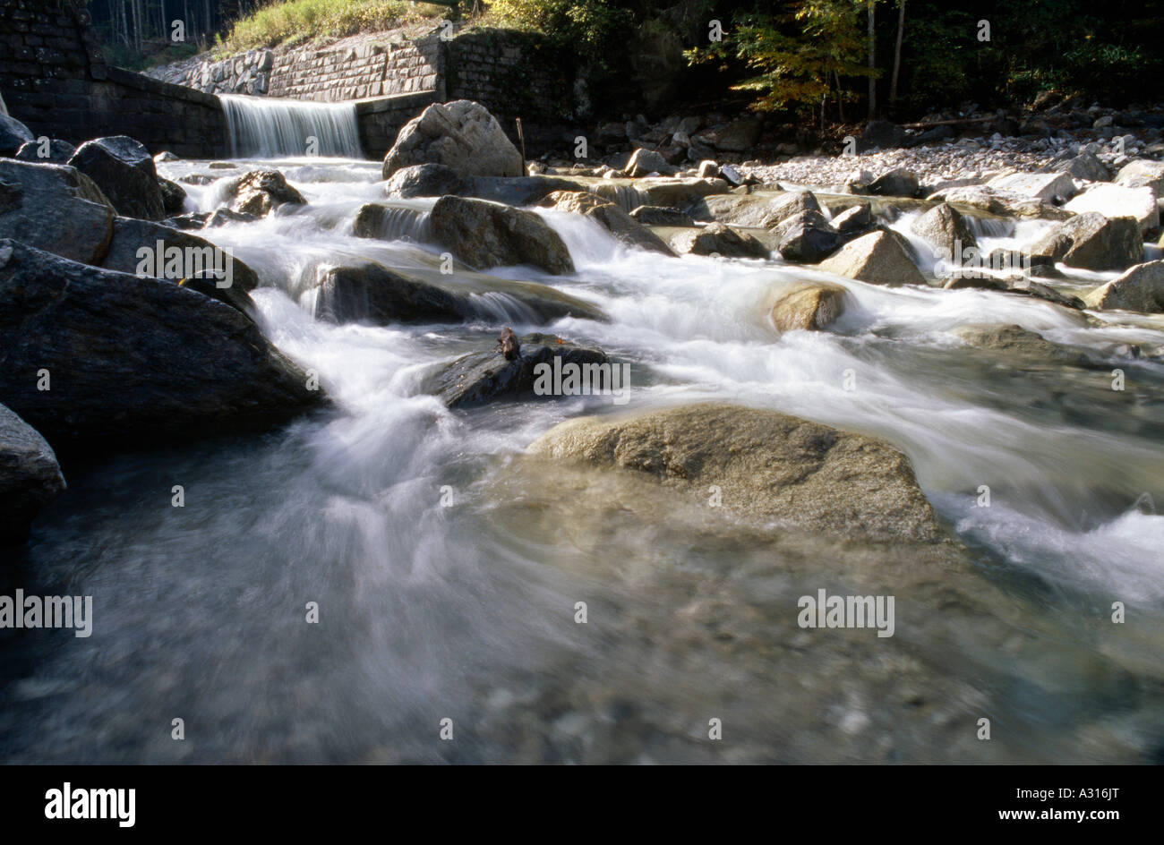 Water flowing in stream Stock Photo - Alamy