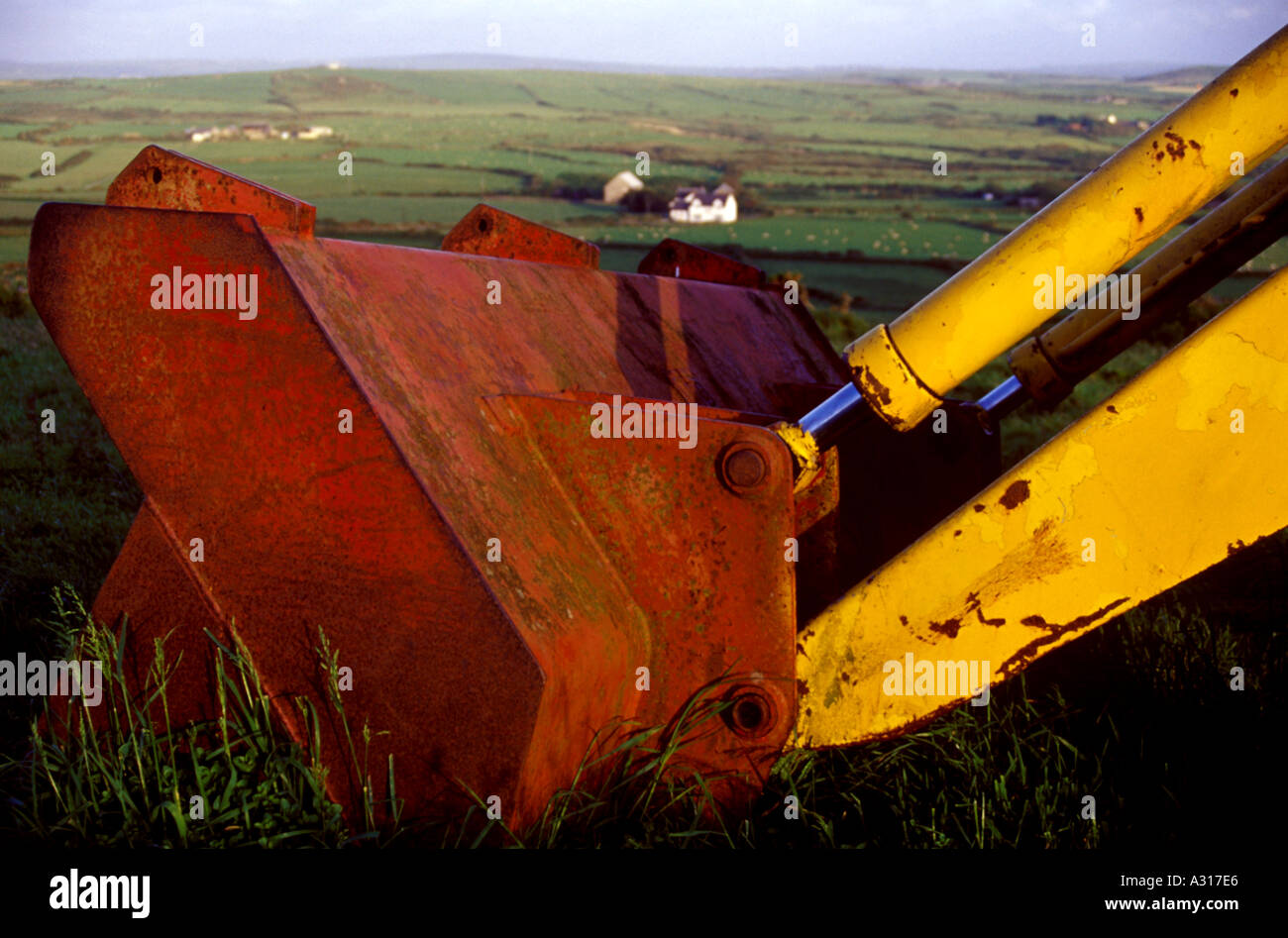 Abandoned JCB digger in the setting sun Wales Stock Photo - Alamy