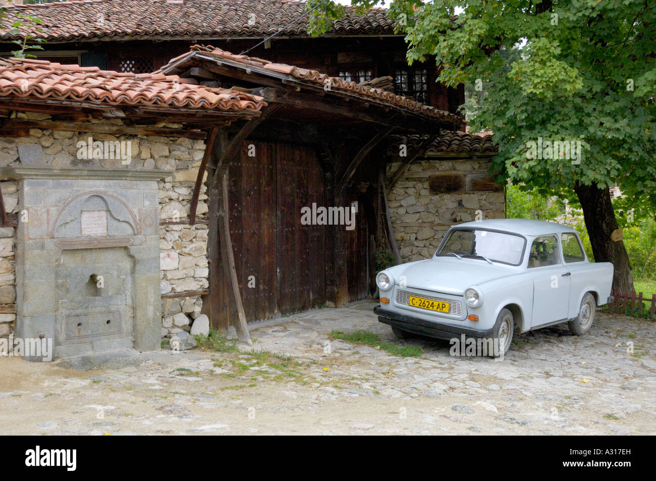 Old grey russian car on cobbled street Koprivshtitsa town museum ...