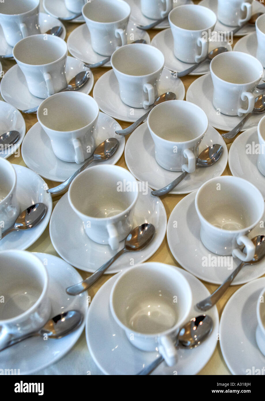 rows of tea cups on table at a function Stock Photo - Alamy