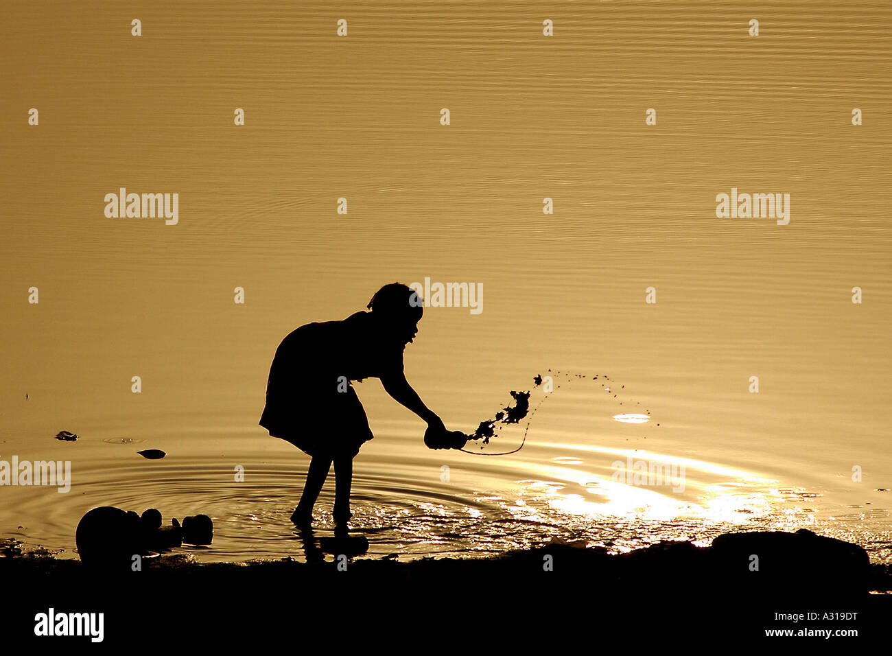 Girl washing in river hi-res stock photography and images - Alamy