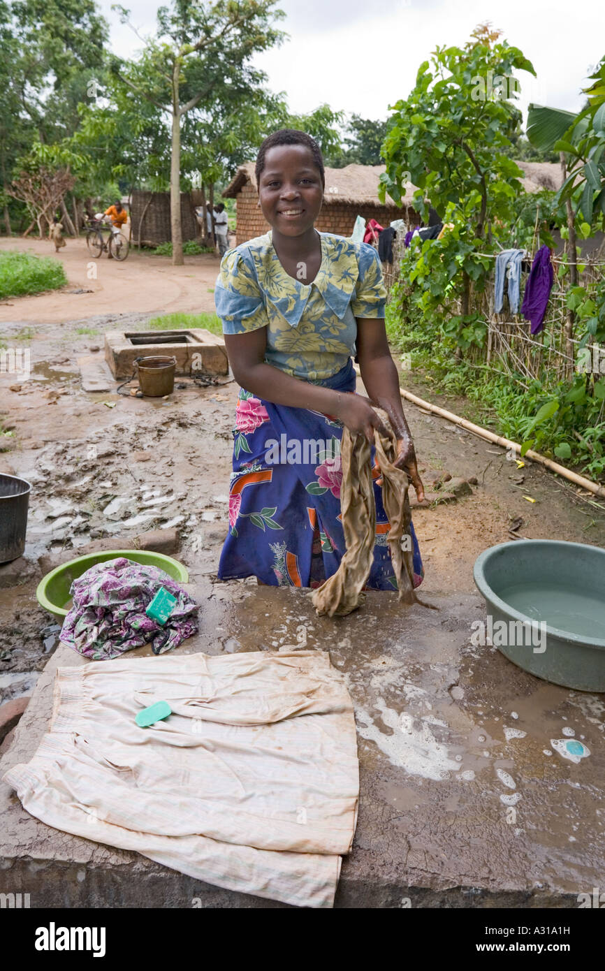 Hand washing clothes in bowl hi-res stock photography and images - Alamy