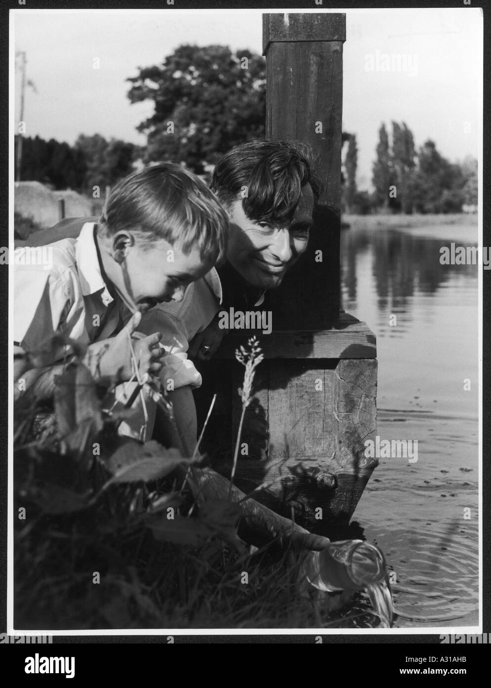 Putting Back Caught Fish Stock Photo - Alamy