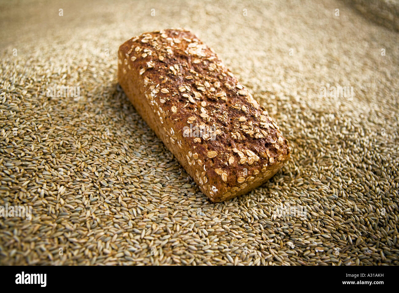 A loaf of bread on top of seed stack Stock Photo - Alamy