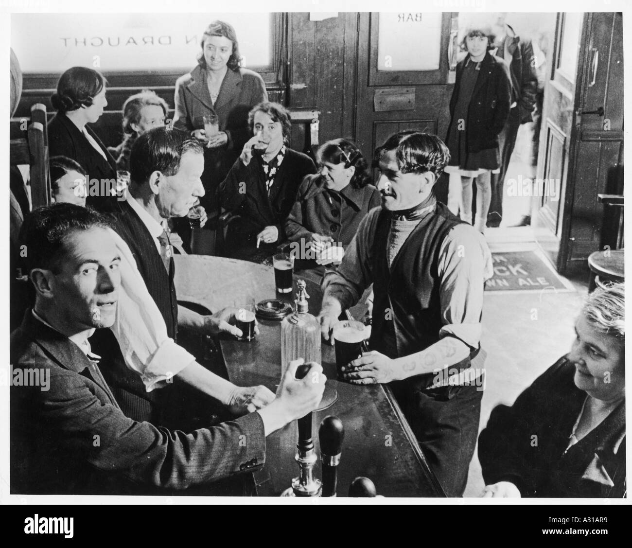 Mixed Bar Scene 1930s Stock Photo - Alamy