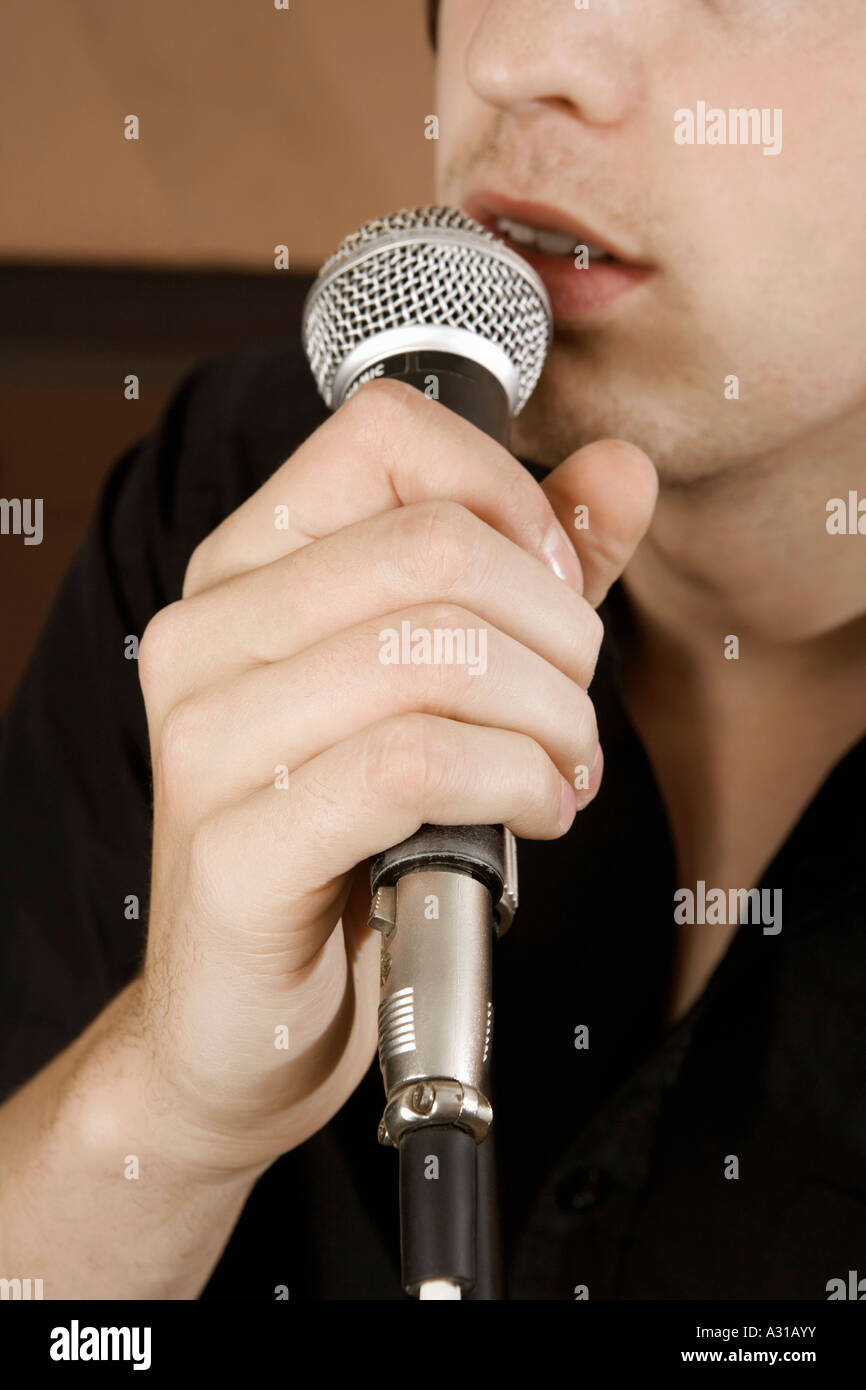 Singer microphone man hi-res stock photography and images - Alamy