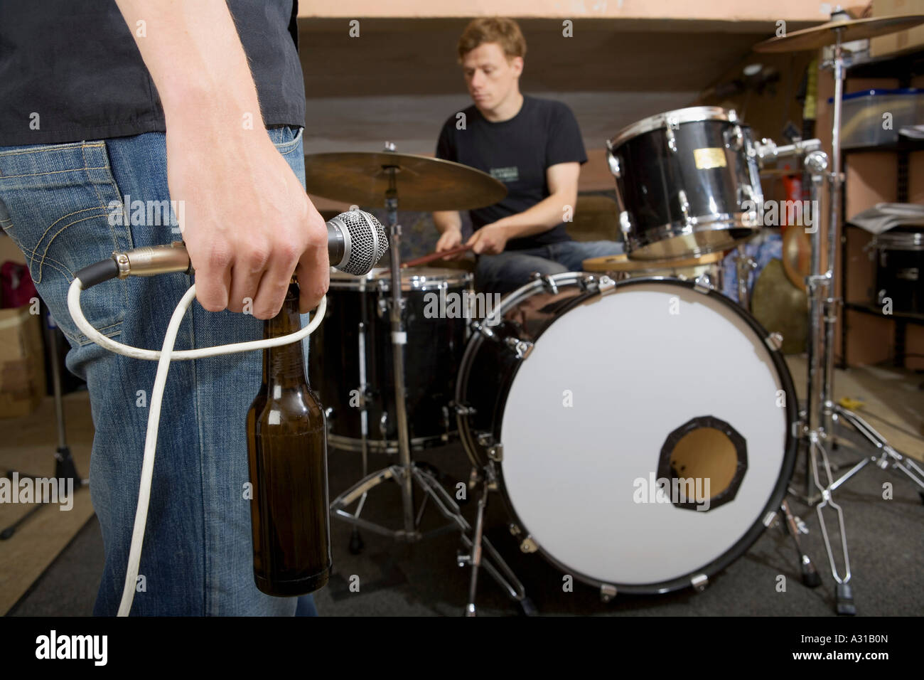 Rock band practicing and drinking beer Stock Photo - Alamy