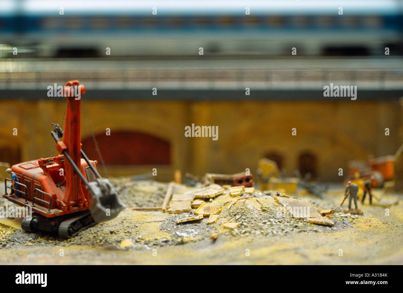 Model of earth mover and manual workers on construction site Stock ...