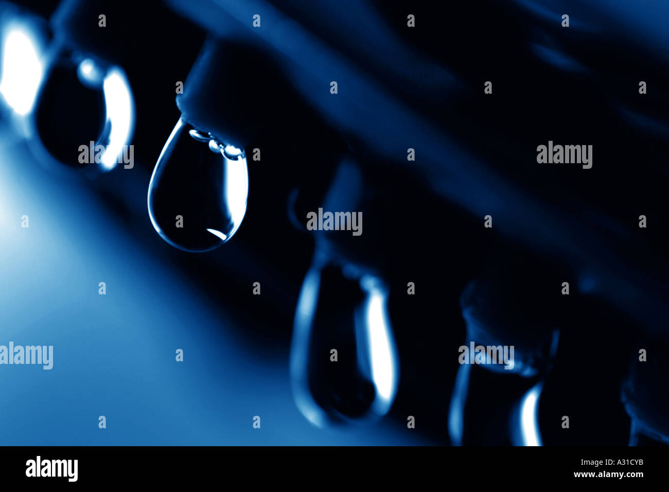 Side view of some water droplets seen under a shower Stock Photo - Alamy