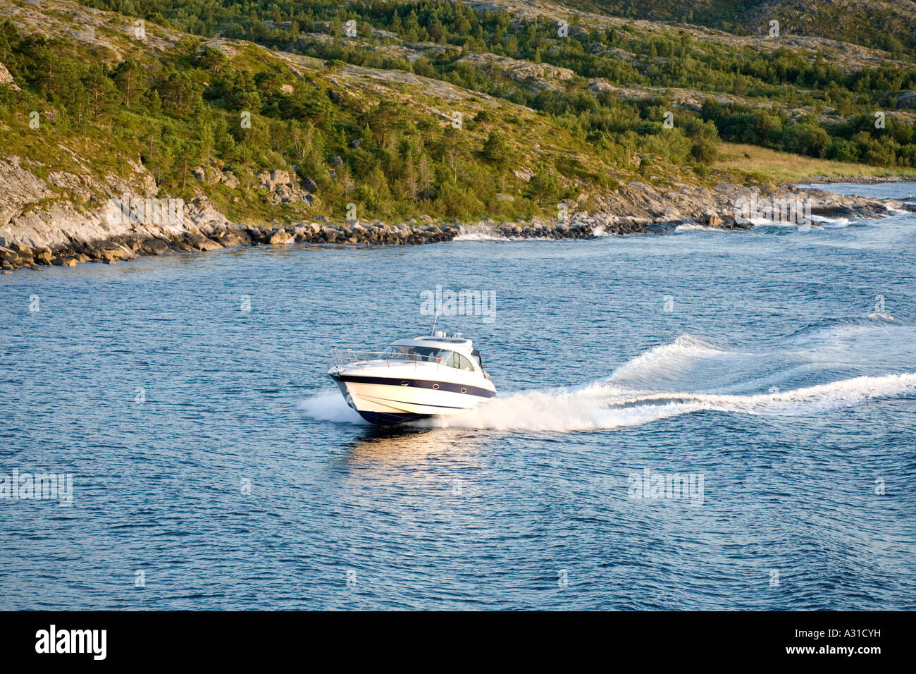 A speedboat in the evening sunlight northeast of Rorvik Norway Stock ...