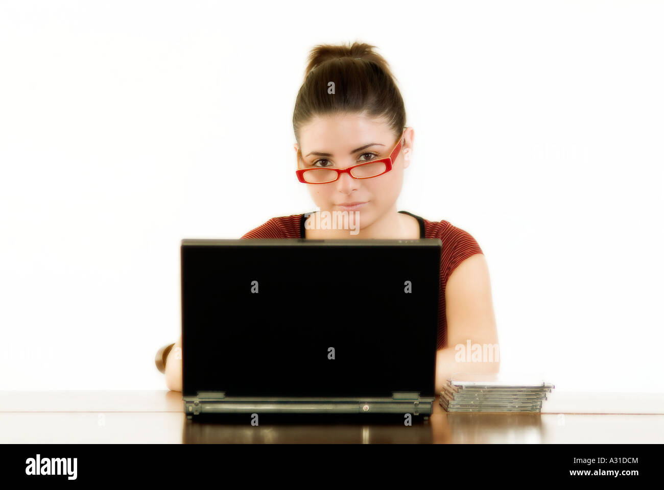 Young girl working with laptop Stock Photo - Alamy