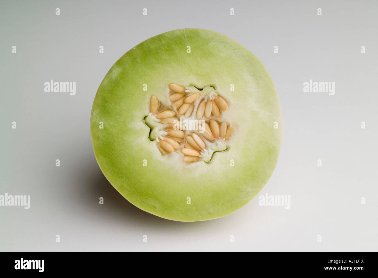 Cross section of honeydew melon Stock Photo - Alamy