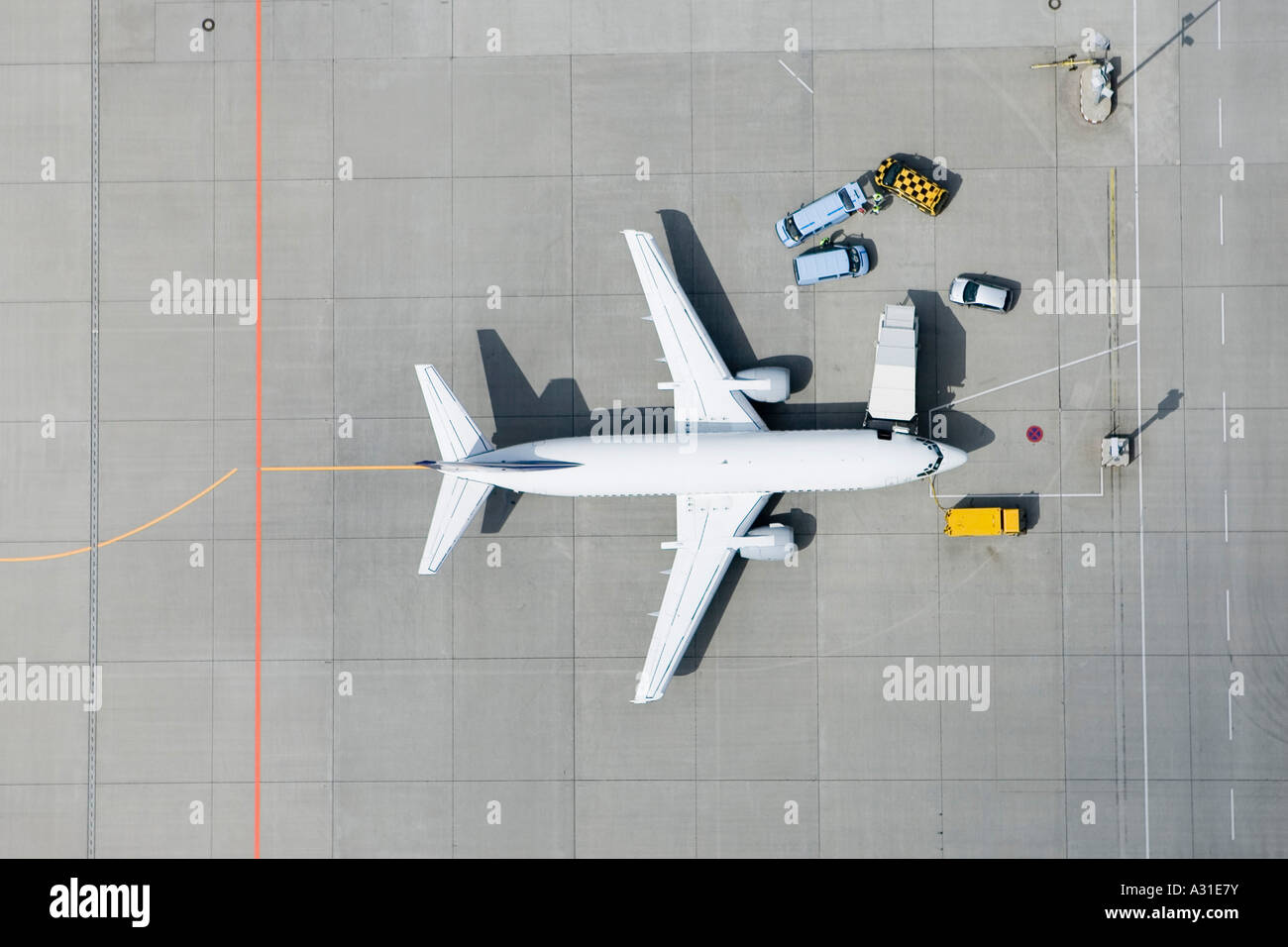 Aerial view of airplane and vans Stock Photo - Alamy