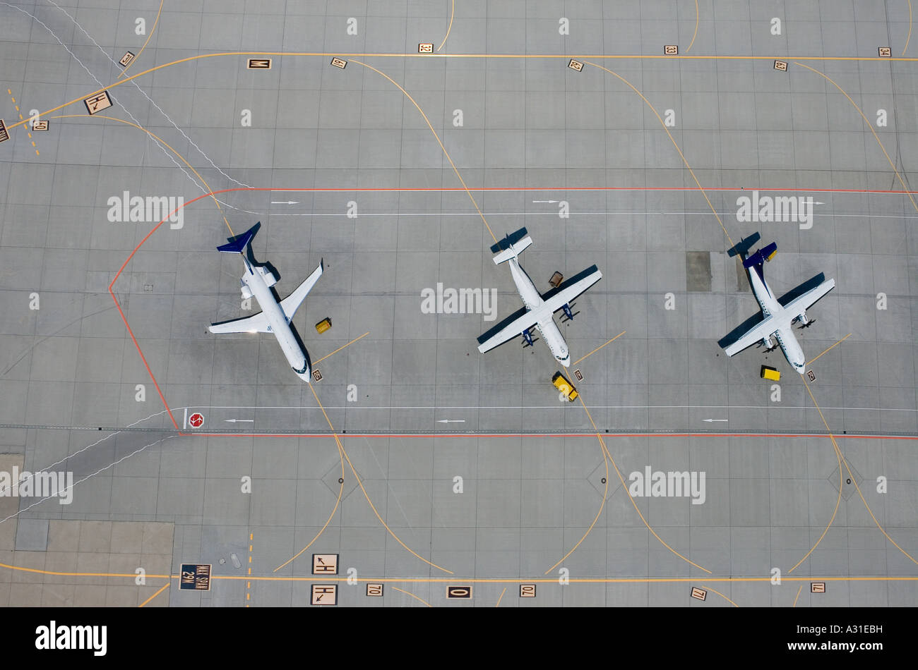 Aerial view of three parked airplanes Stock Photo - Alamy