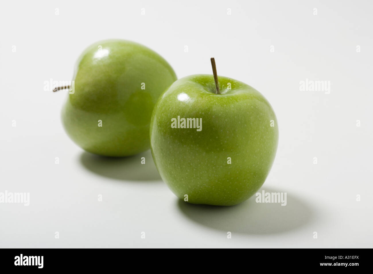 Two Granny Smith apples Stock Photo - Alamy