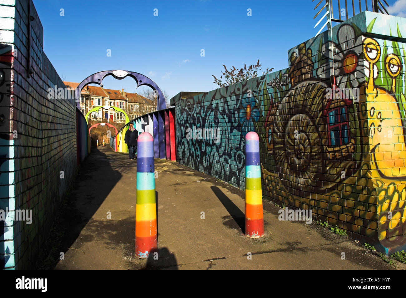 Rainbow painted pedestrian bridge over rail line Montpelier Bristol UK ...
