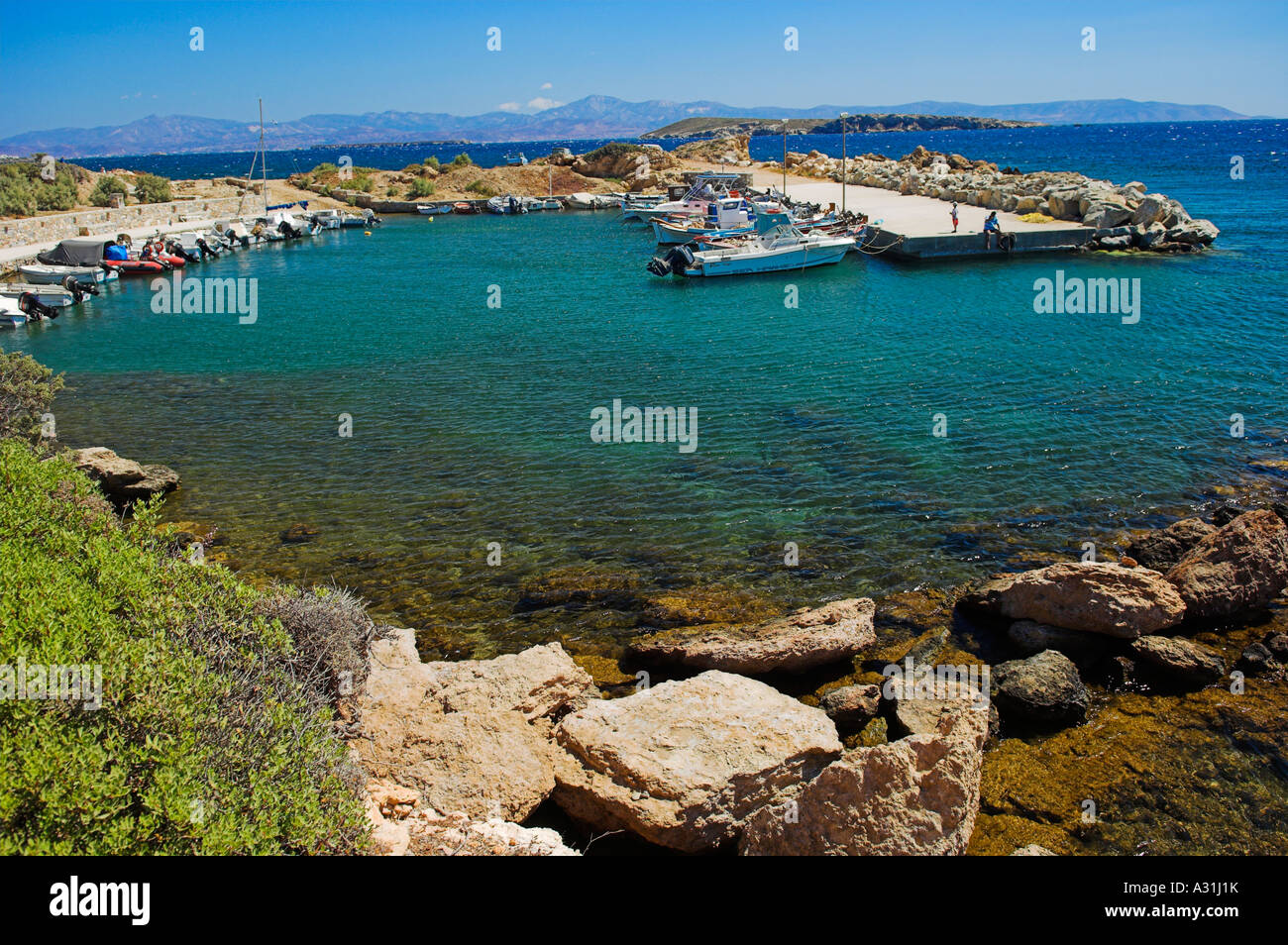 Idyllic small harbour and bay of Pirghos south side of Paros island ...