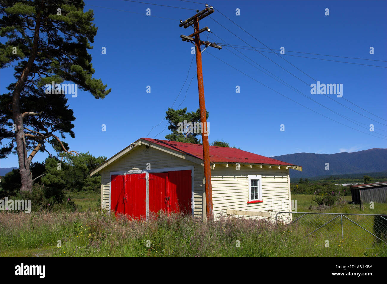 Old garage with red doors. Ahaura Culvert, South Island, New Zealand ...
