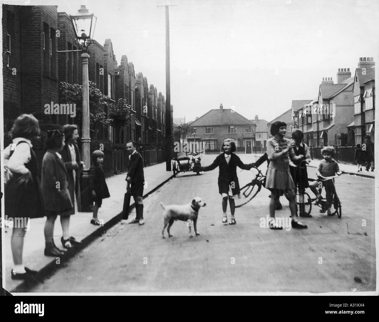 1930s children playing hi-res stock photography and images - Alamy