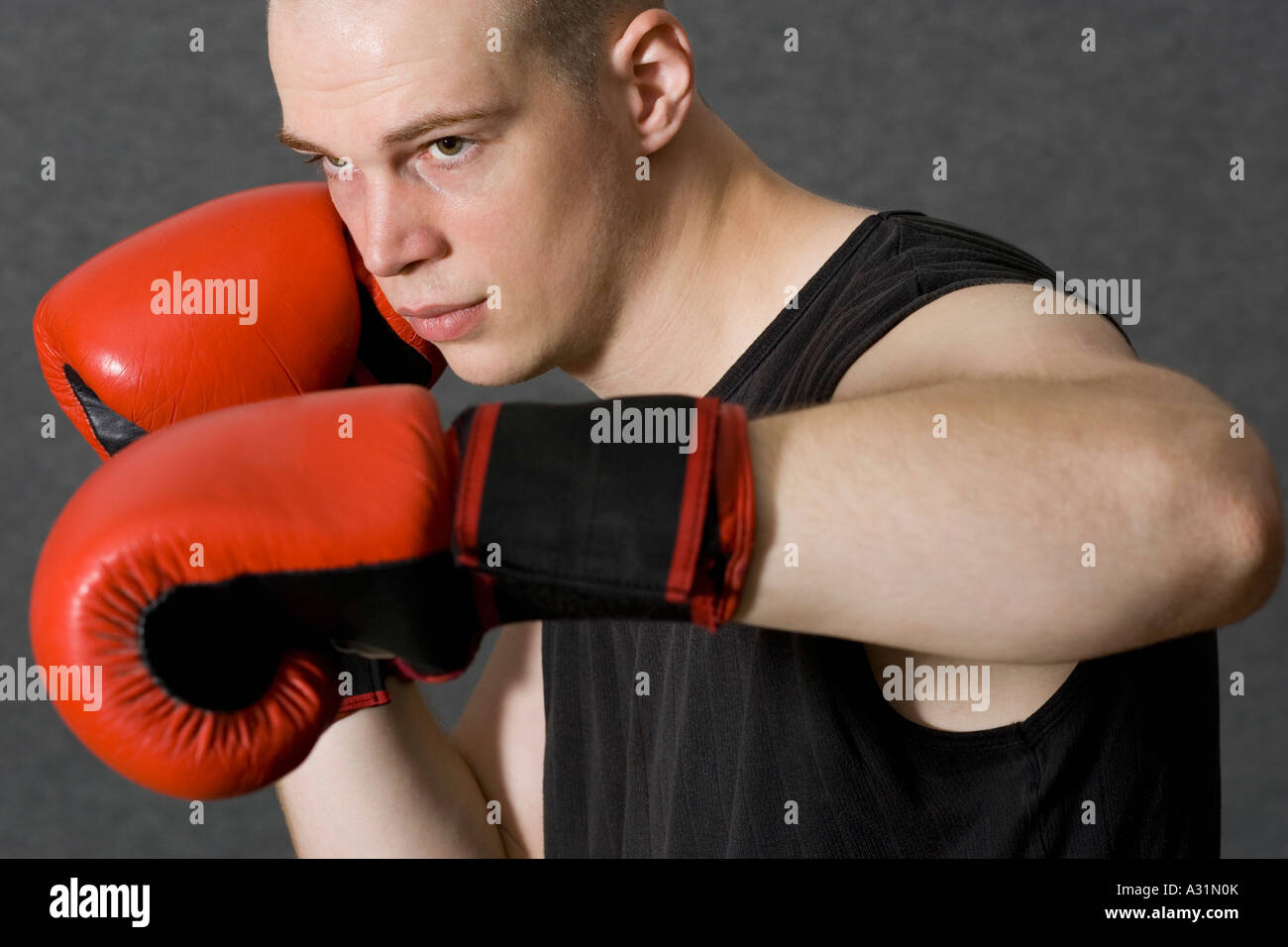 Black man fist above head hi-res stock photography and images - Alamy