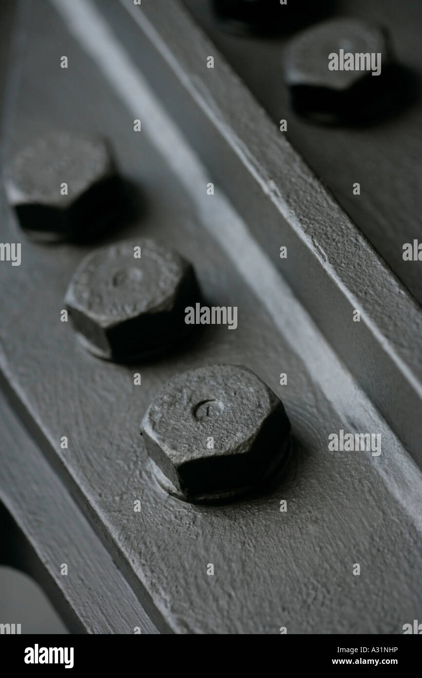 Bolts attached to panel Stock Photo - Alamy