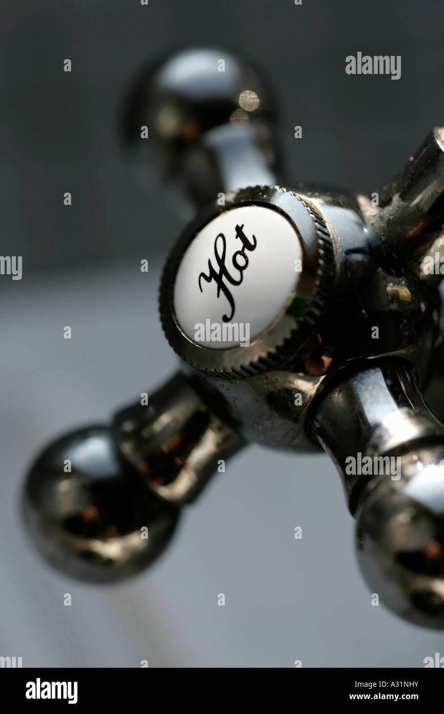 Hot water faucet Stock Photo - Alamy