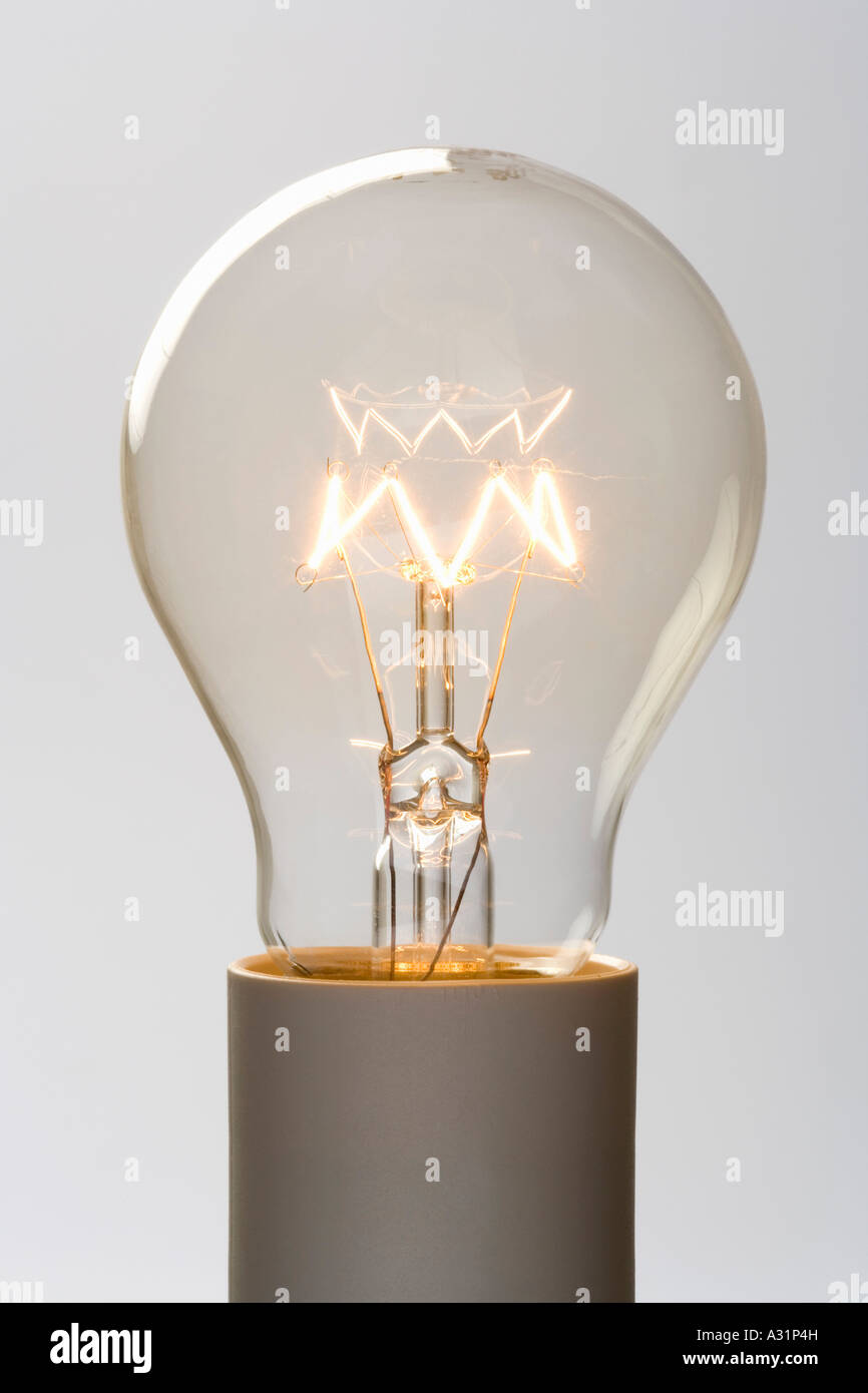 Light bulb filament glowing Stock Photo - Alamy