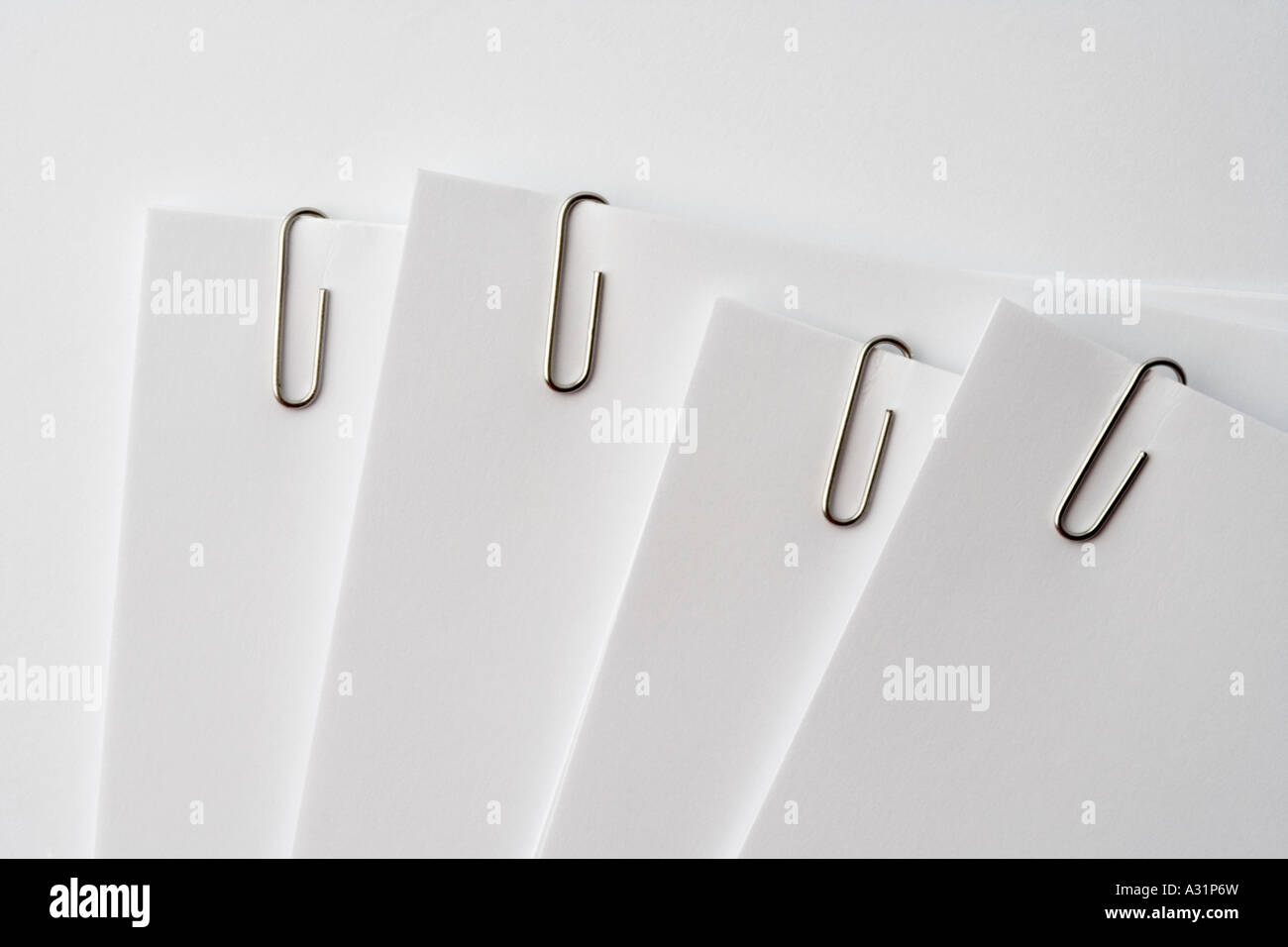 Four documents fanned out Stock Photo - Alamy