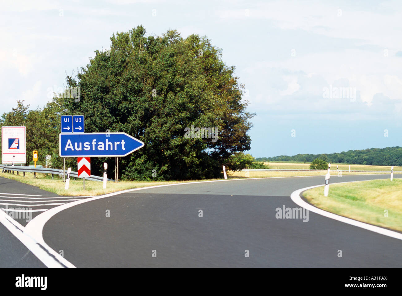 Exit sign on highway Stock Photo - Alamy