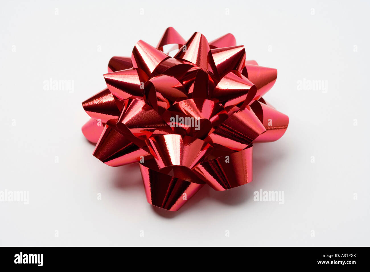 Red ribbon rosette Stock Photo - Alamy