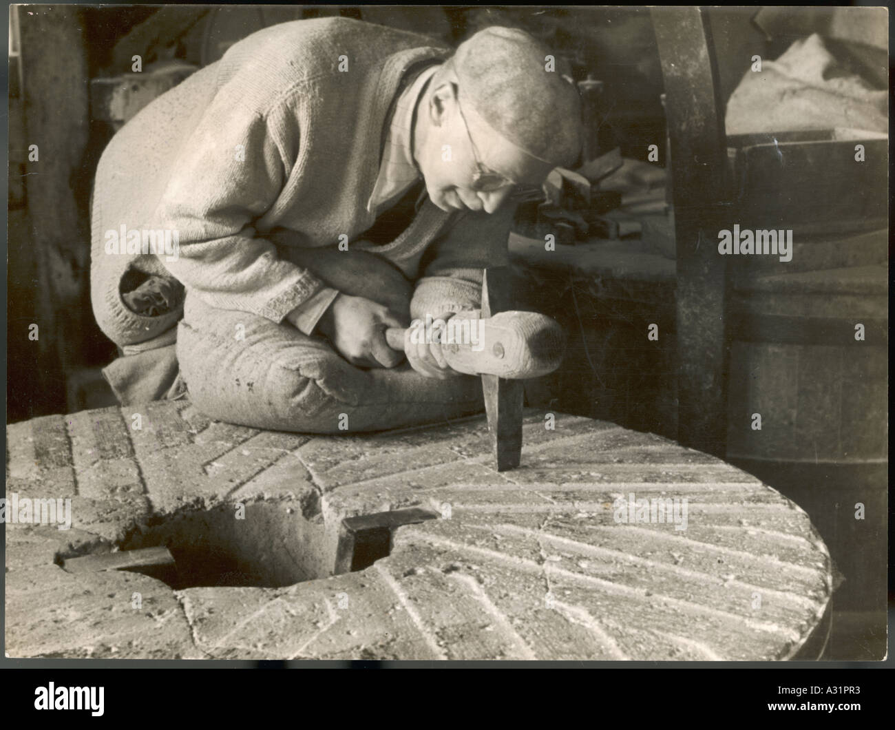 Dressing A Millstone Stock Photo - Alamy